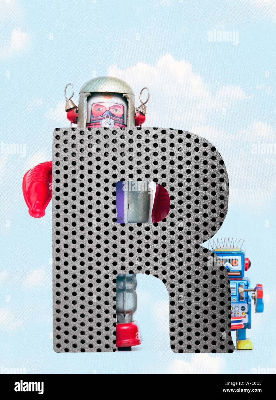 retro robots holding a big metal letter R with blue sky and clouds ...