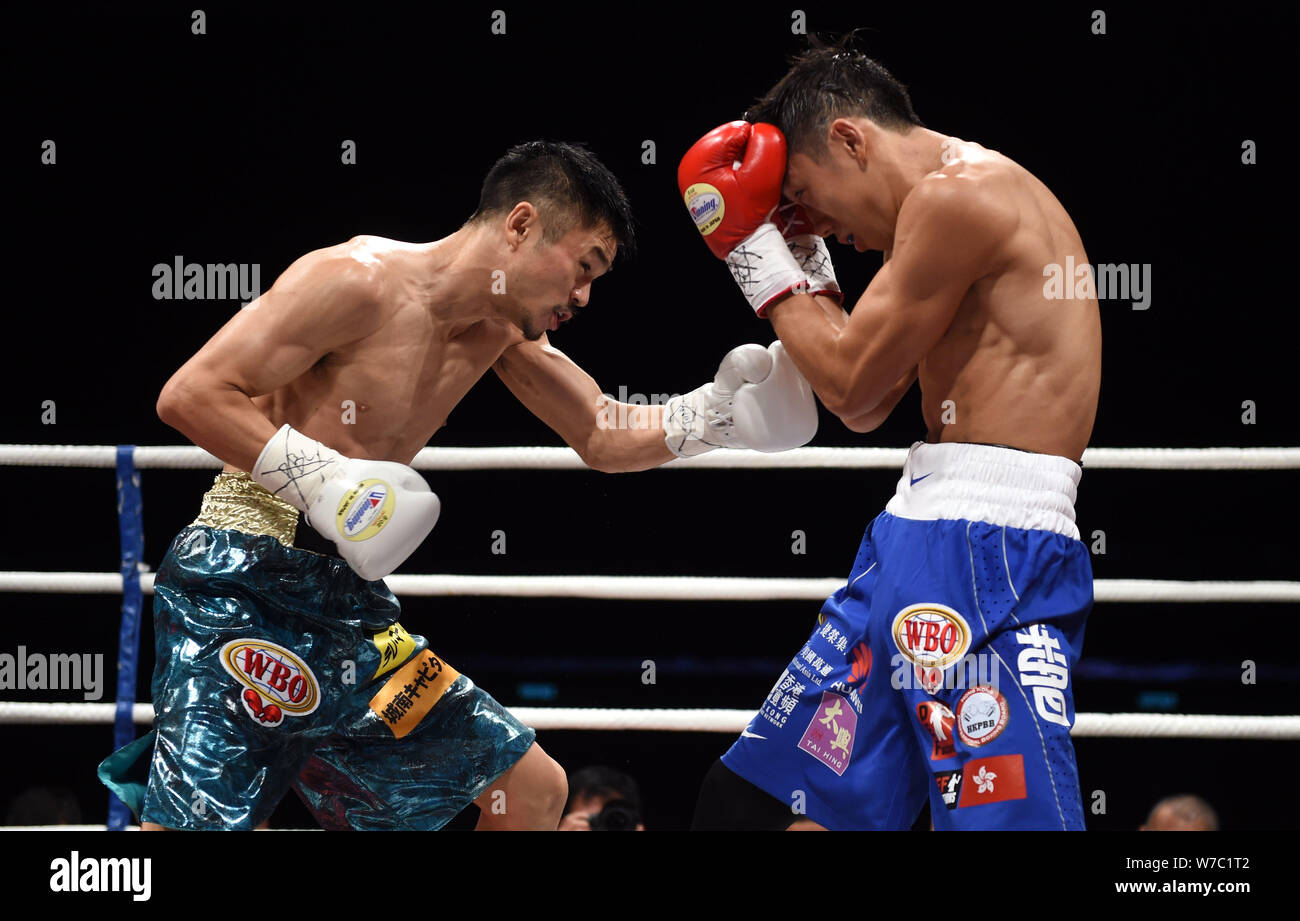 Rex Tso Sing-yu of Hong Kong, right, competes against Kohei Kono of ...