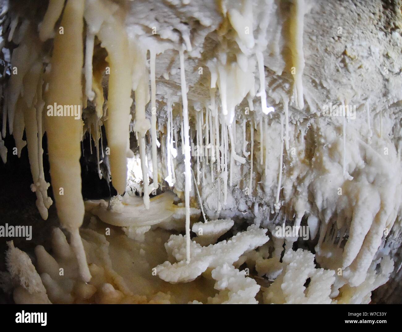 View of the snow-white stalactites and stalagmites in the Snow Jade ...