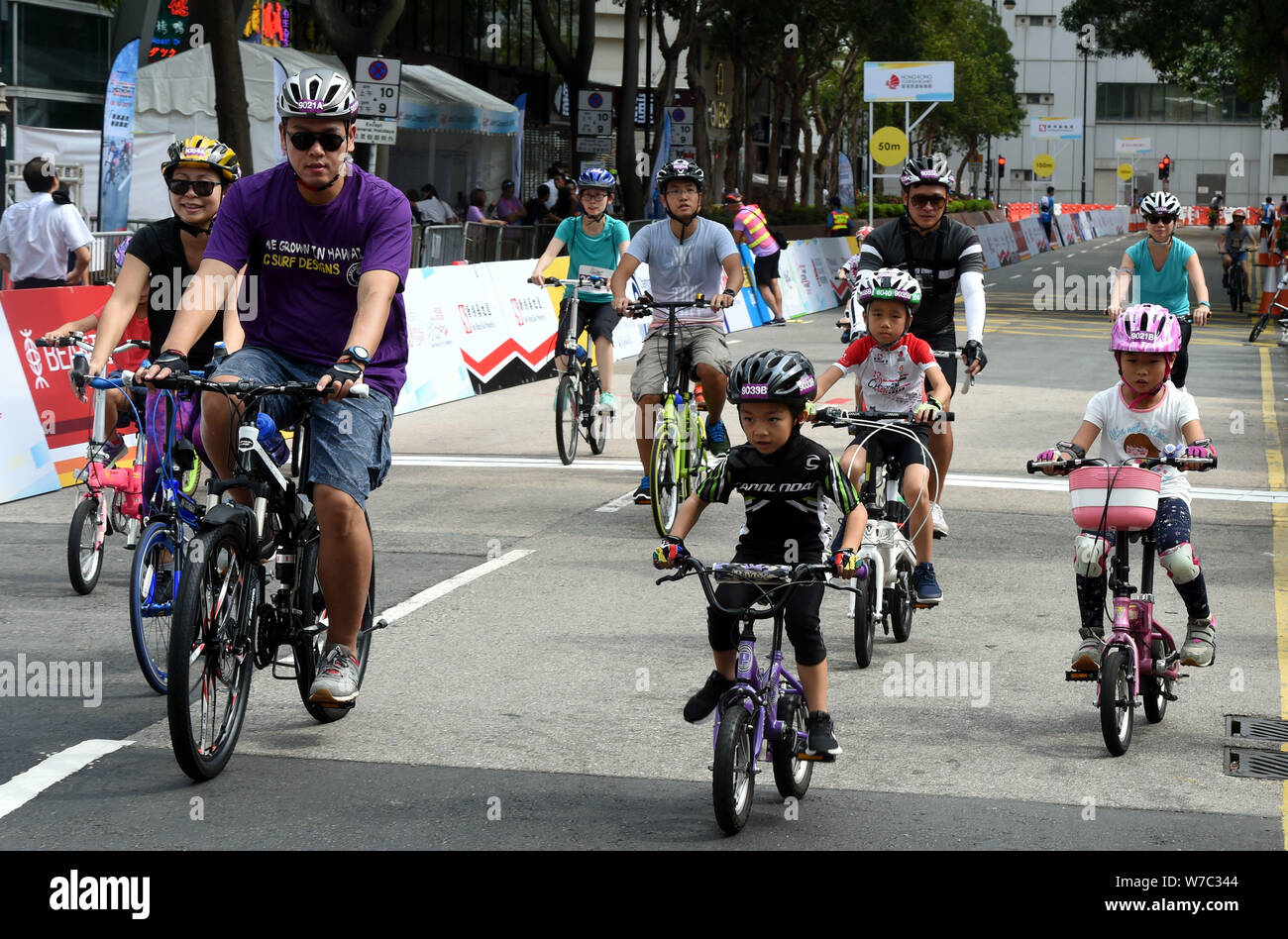 Participants take part in the third Hong Kong Cyclothon, which is ...