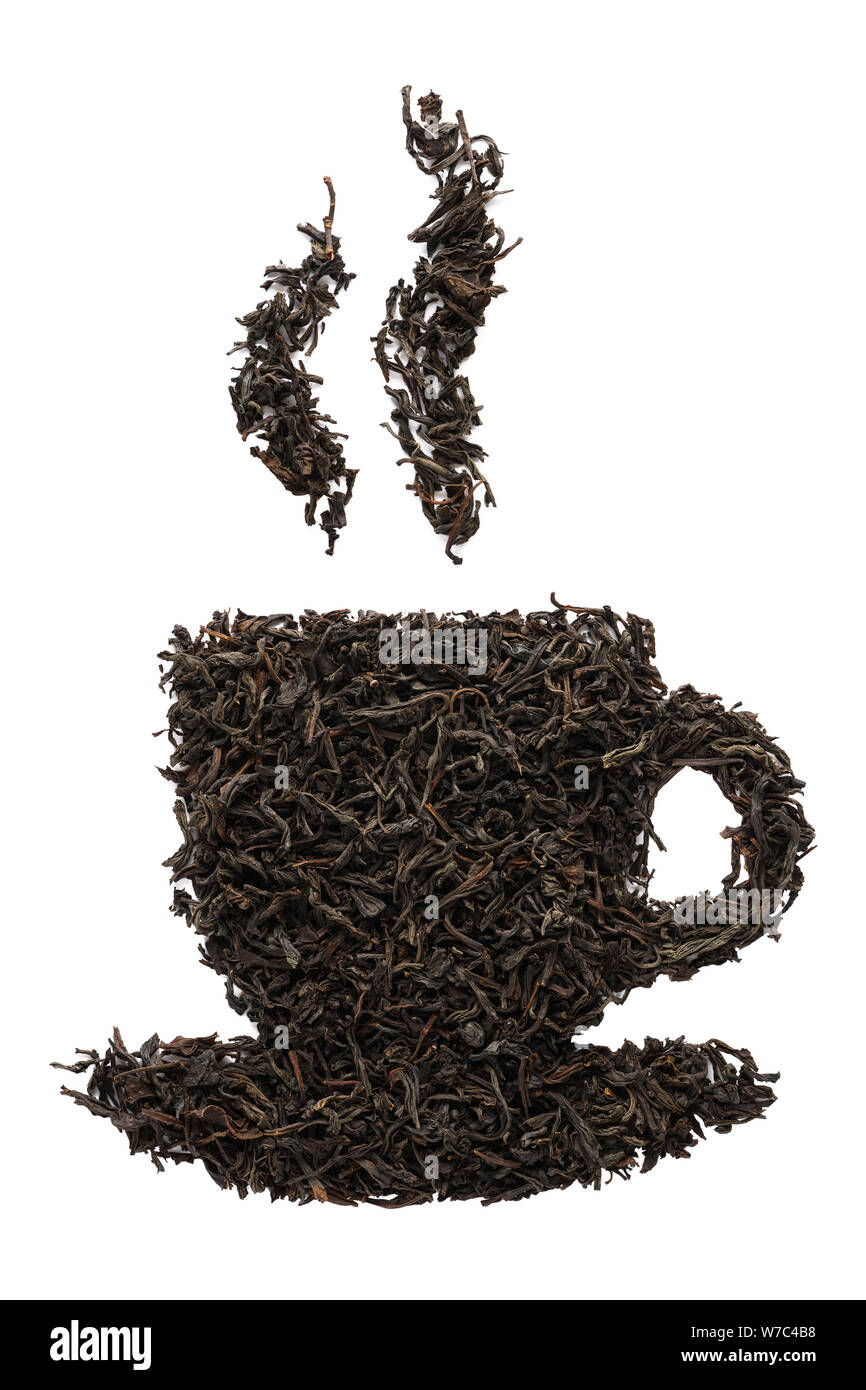 Tea cup shape made of dry black tea leaves. Isolated Stock Photo - Alamy