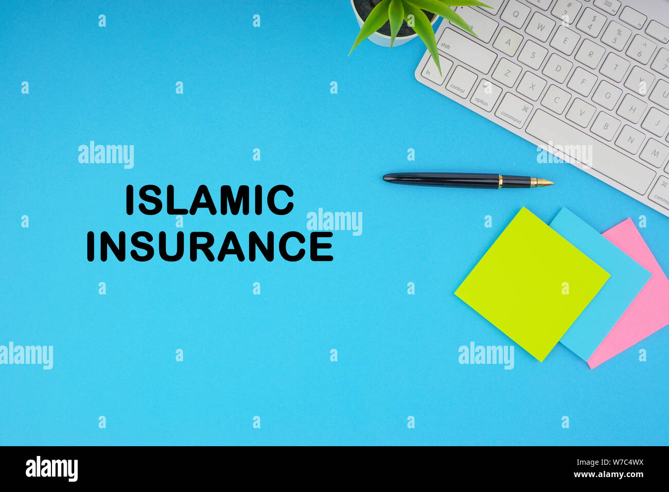 Flat lay, top view office table desk. Workspace with ISLAMIC INSURANCE ...
