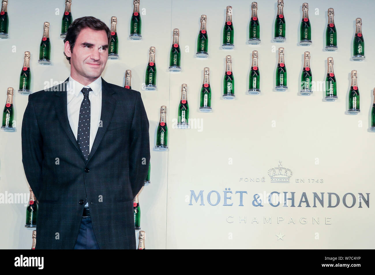 Swiss tennis player Roger Federer poses at the Moet and Chandon Party ...