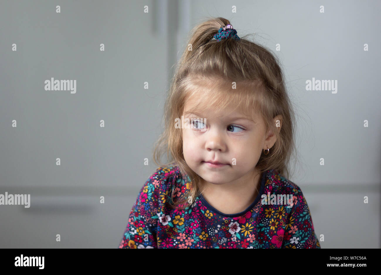 Portrait of thinking and pensive child Stock Photo - Alamy