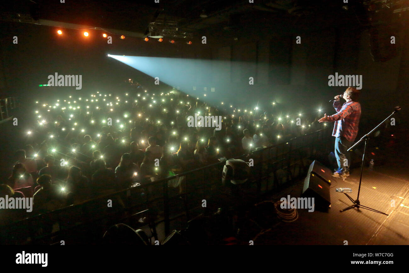 A member of South Korean indie acoustic pop band performs during the ...