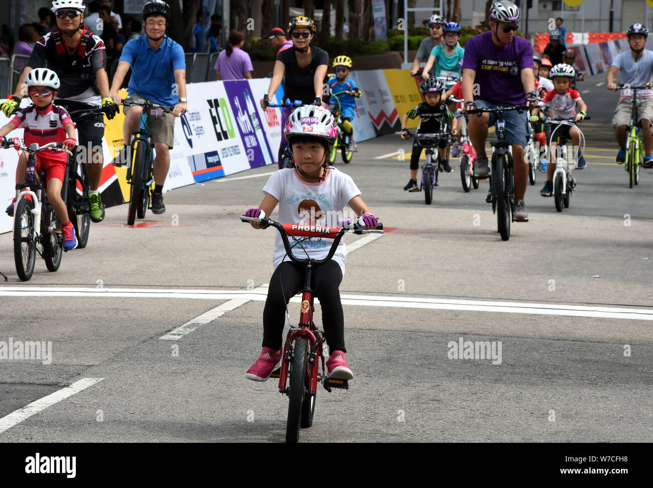 Participants take part in the third Hong Kong Cyclothon, which is ...