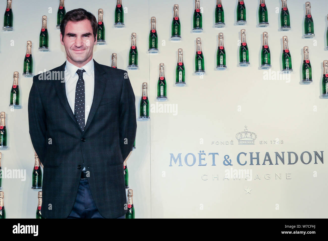 Swiss tennis player Roger Federer poses at the Moet and Chandon Party ...