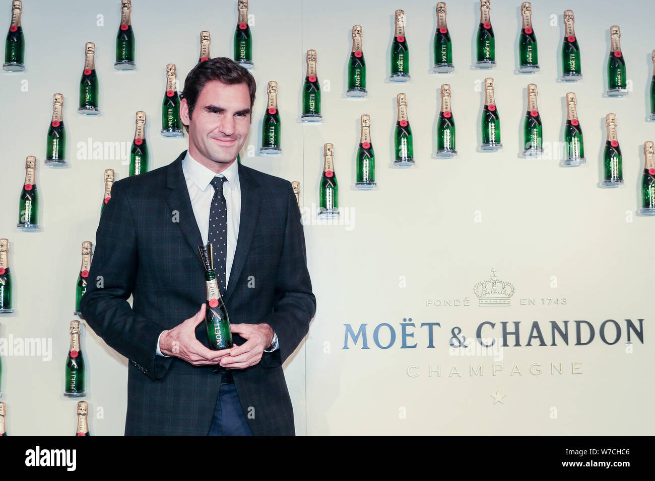 Swiss tennis player Roger Federer poses at the Moet and Chandon Party ...
