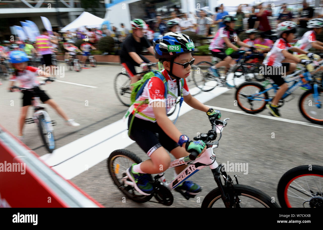 Participants take part in the third Hong Kong Cyclothon, which is ...