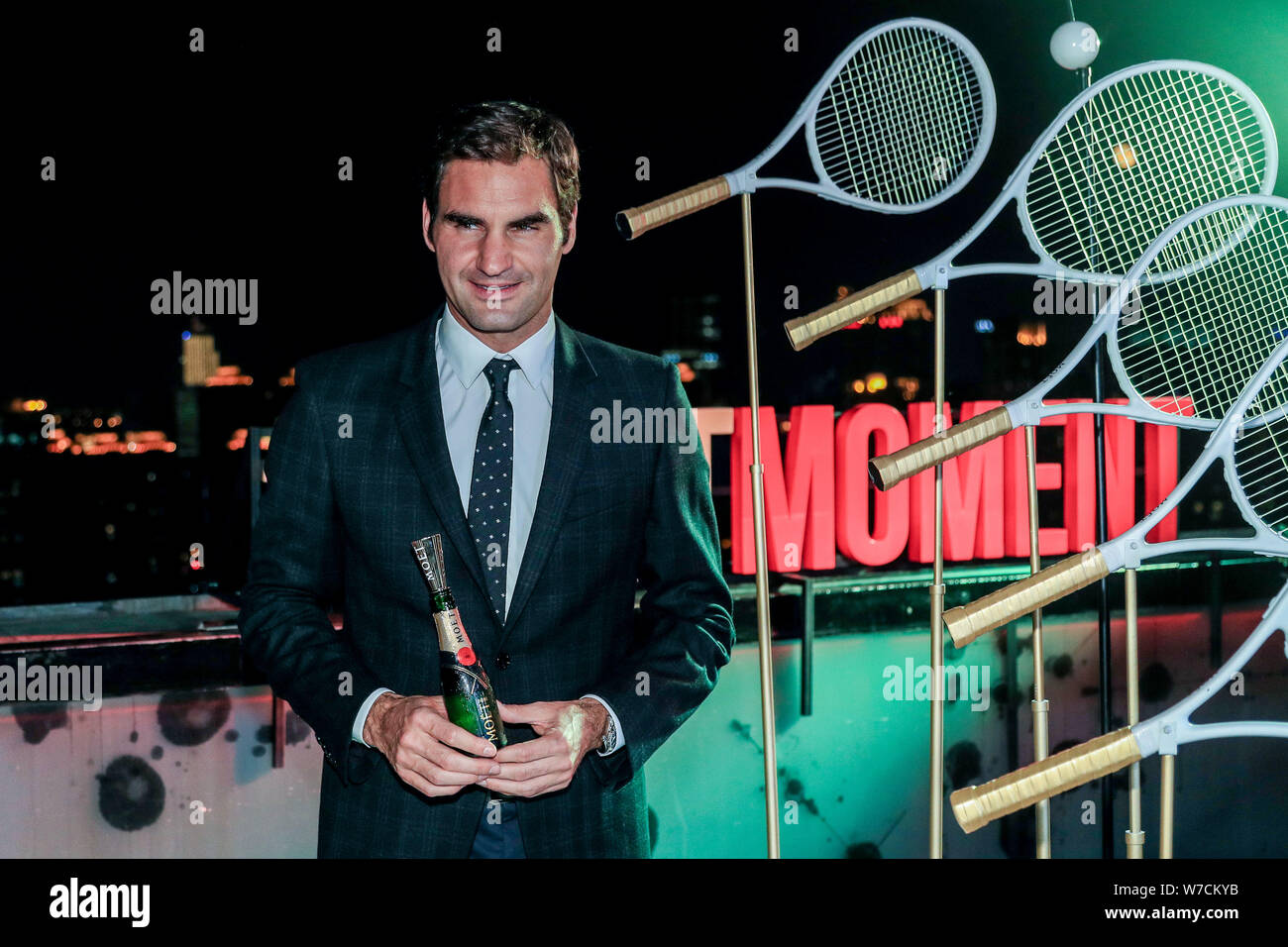 Swiss tennis player Roger Federer poses at the Moet and Chandon Party during the Shanghai Rolex ...