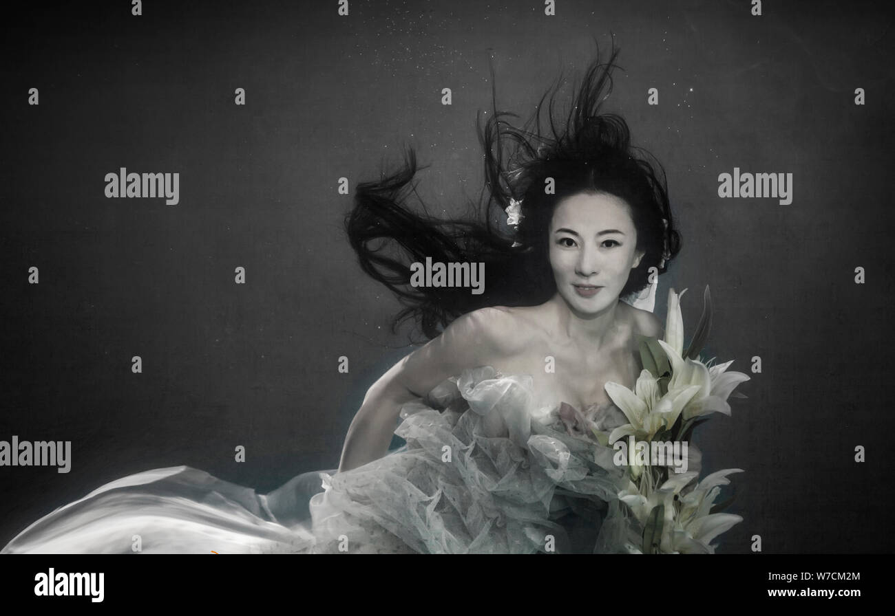 50-year-old Chinese fitness enthusiast Liu Yelin poses for a portrait ...