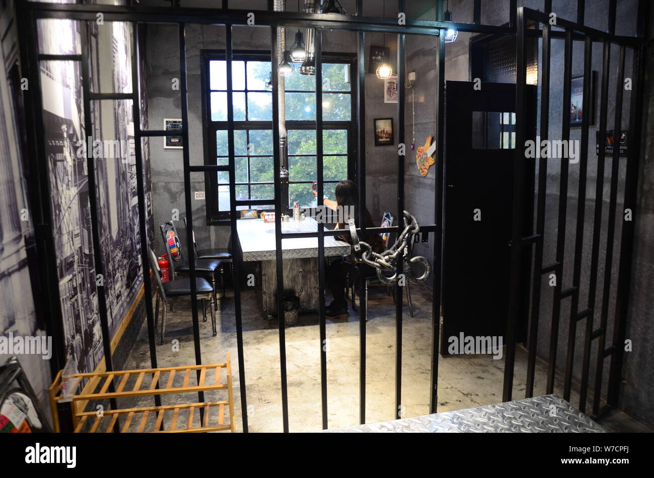 View of a cell-like dining room at a prison-themed restaurant in ...
