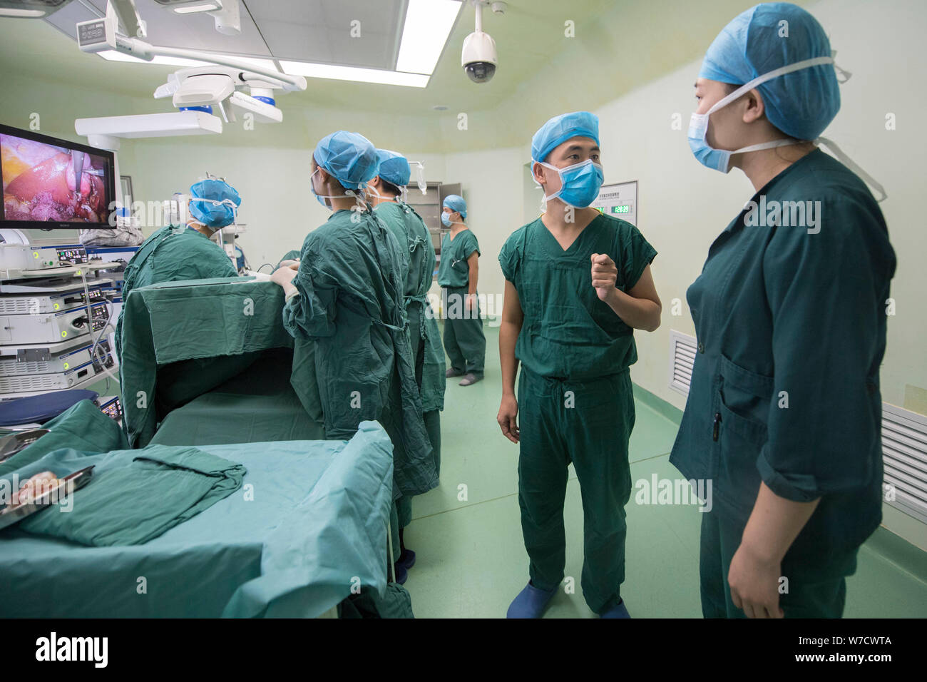 Qiao Rui, second right, the sole male chief nurse at the Affiliated ...