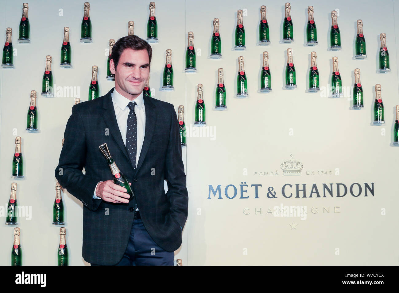 Swiss tennis player Roger Federer poses at the Moet and Chandon Party ...
