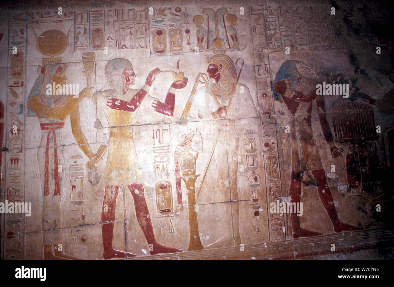 Painted relief of Sethos before Osiris, Temple of Sethos, Abydos, Egypt ...