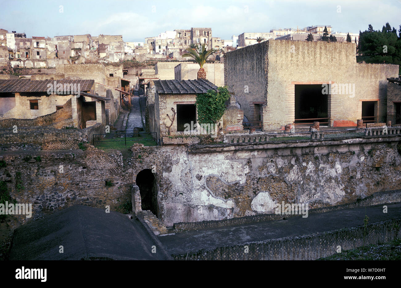 Buildings of Herculaneum with houses of the modern town of Ercolano ...