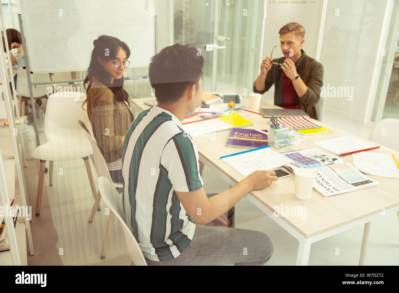 Group of young people practicing their language Stock Photo - Alamy