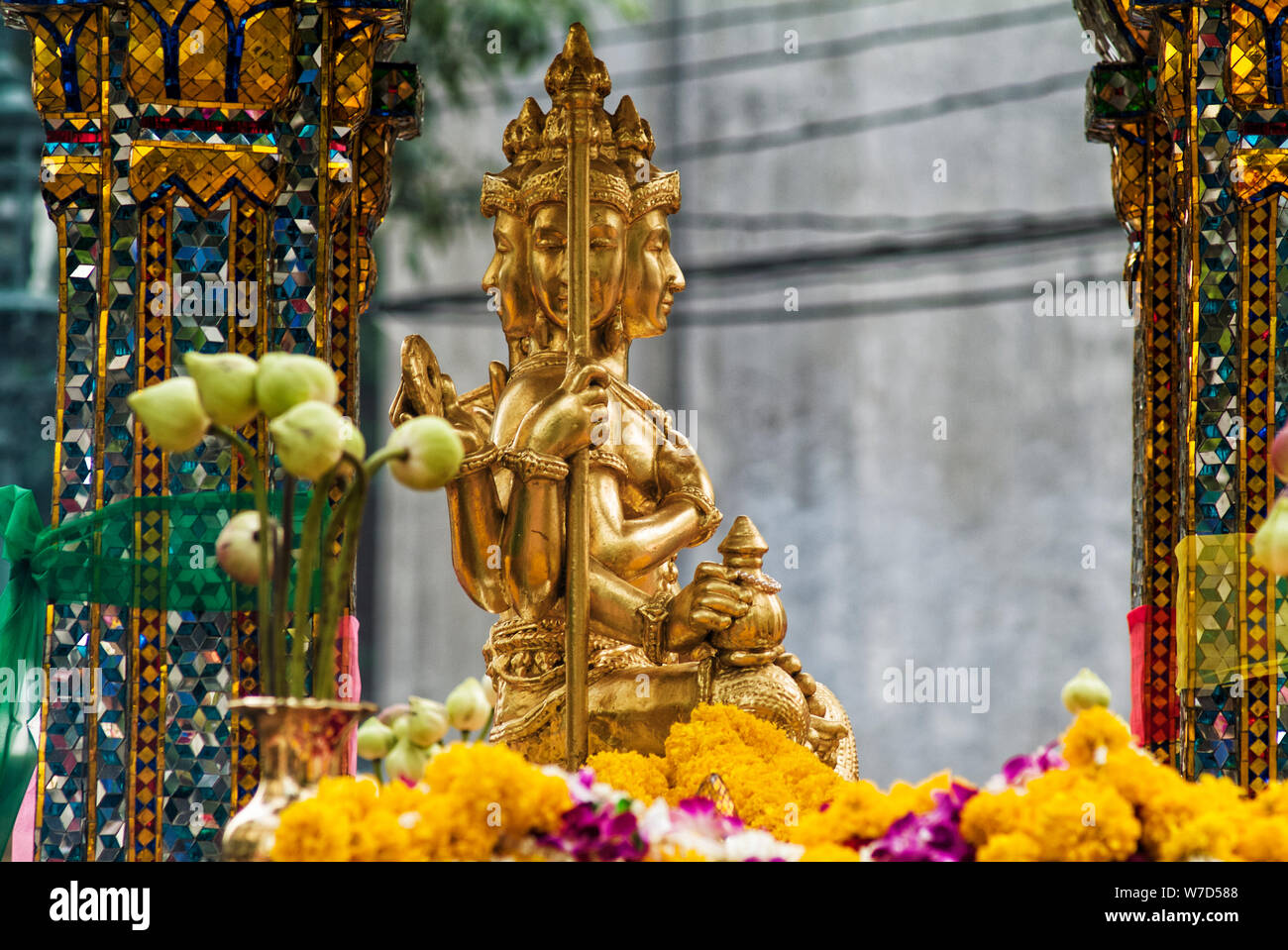 a statue of Phra Phrom, the Thai representation of Brahma, the Hindu ...