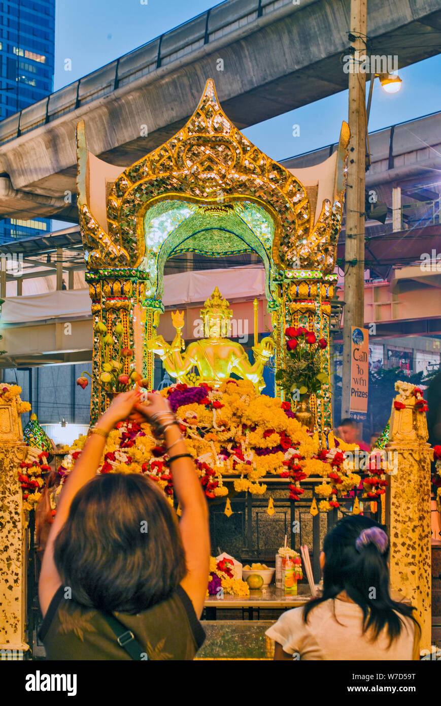 a statue of Phra Phrom, the Thai representation of Brahma, the Hindu ...