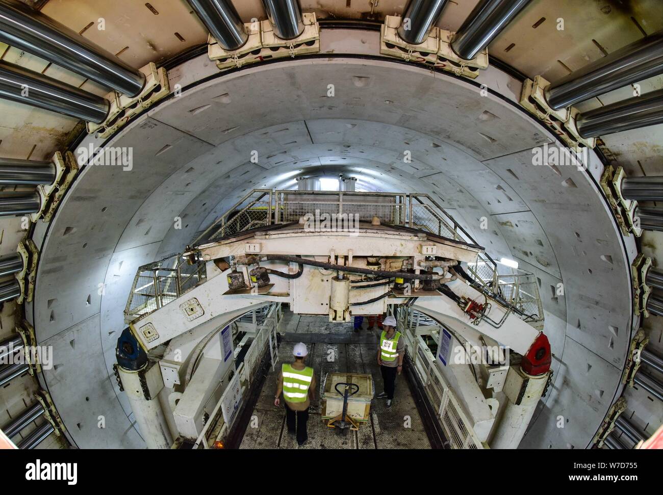 Chinese workers labor at the construction site of the world's first ...