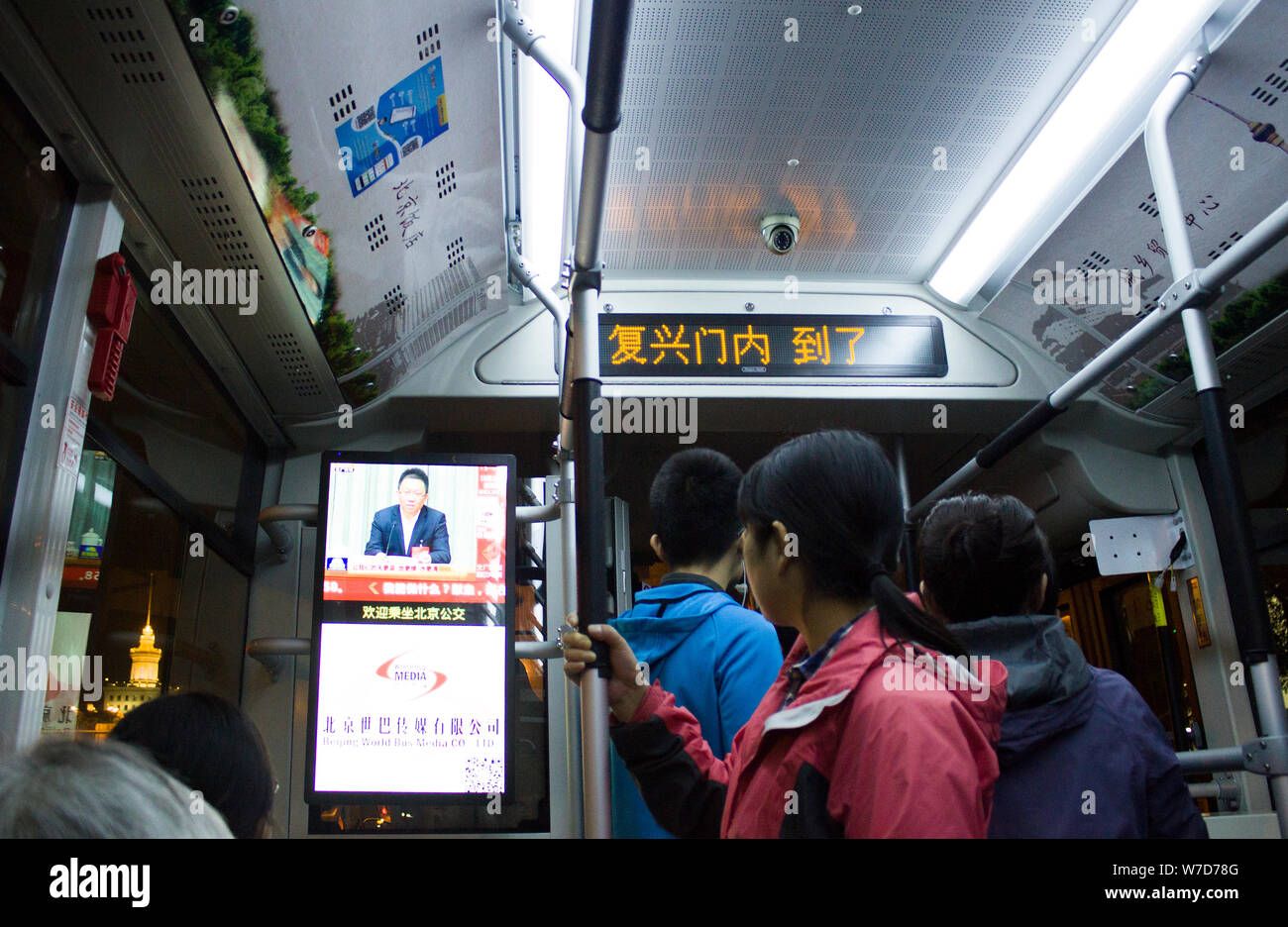 Passengers take a ride on one of the first batch of 10 electric buses ...