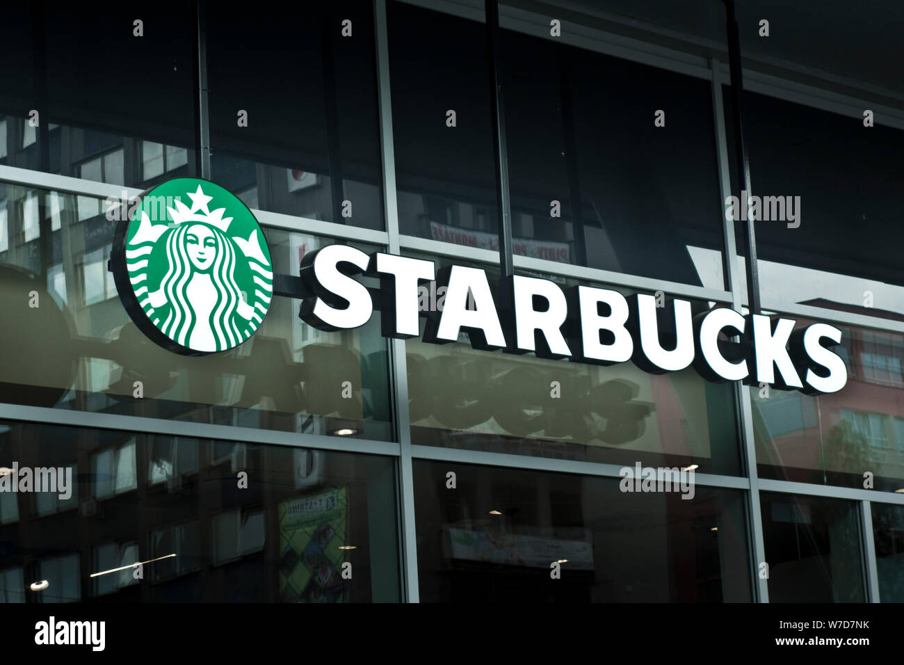 outside of a coffeehouse chain Starbucks and logo Stock Photo - Alamy