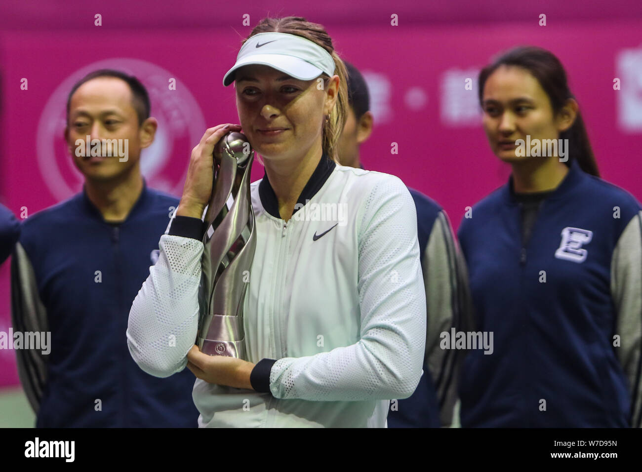 Maria Sharapova of Russia poses with her trophy at the award ceremony ...