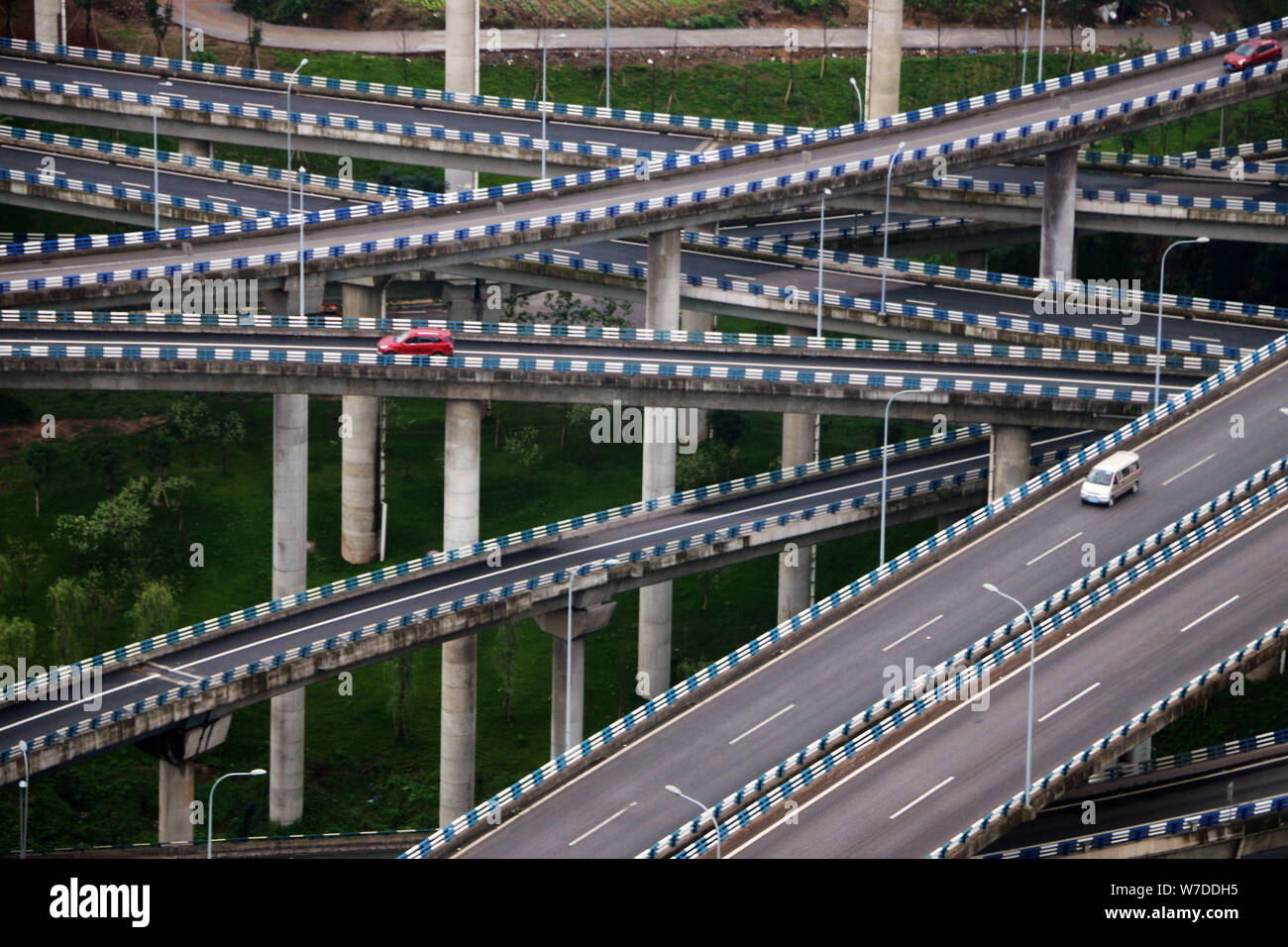 Cars drive on the five-level Huangjuewan Overpass, the world's "most ...
