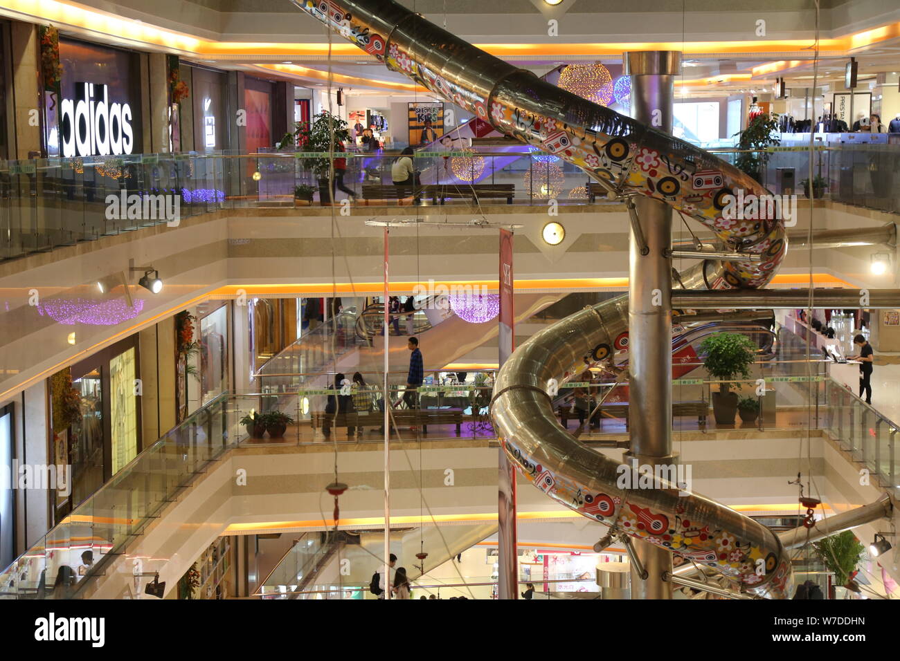 View of a huge slide with four curves at a shopping mall in Shanghai ...