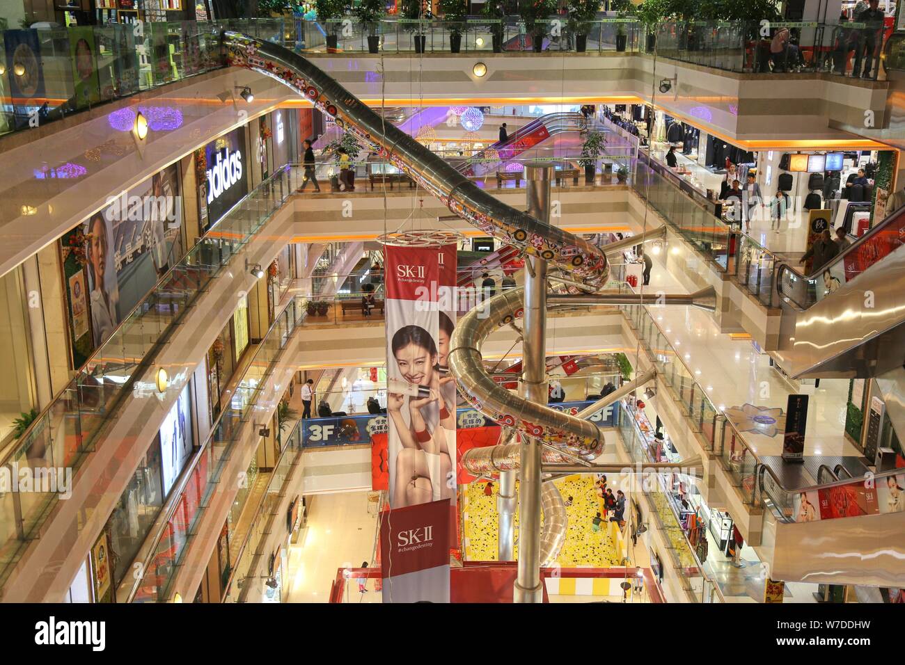 View of a huge slide with four curves at a shopping mall in Shanghai ...