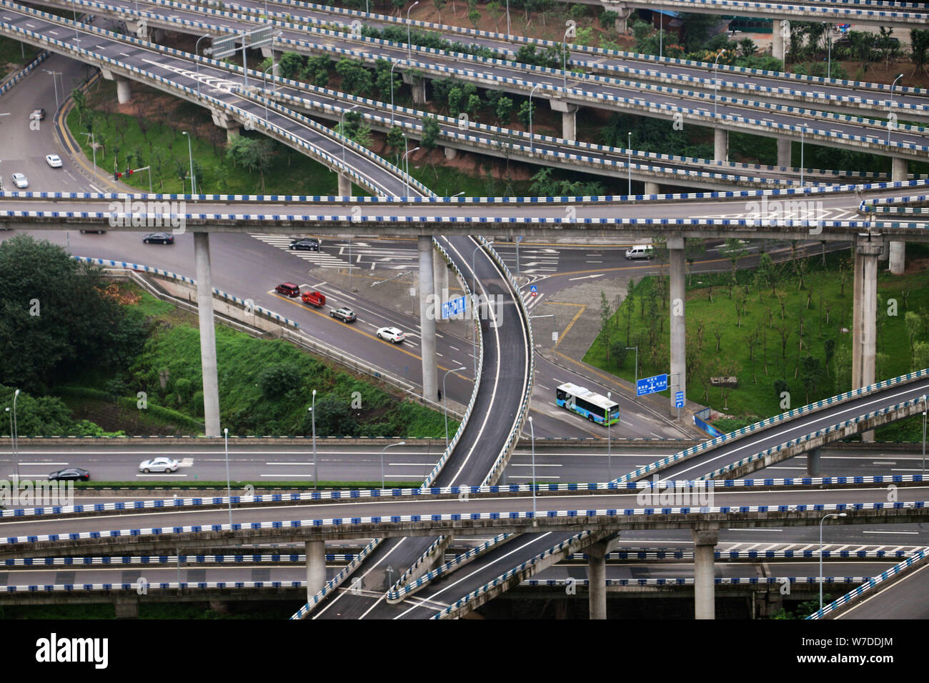 Cars drive on the five-level Huangjuewan Overpass, the world's "most ...