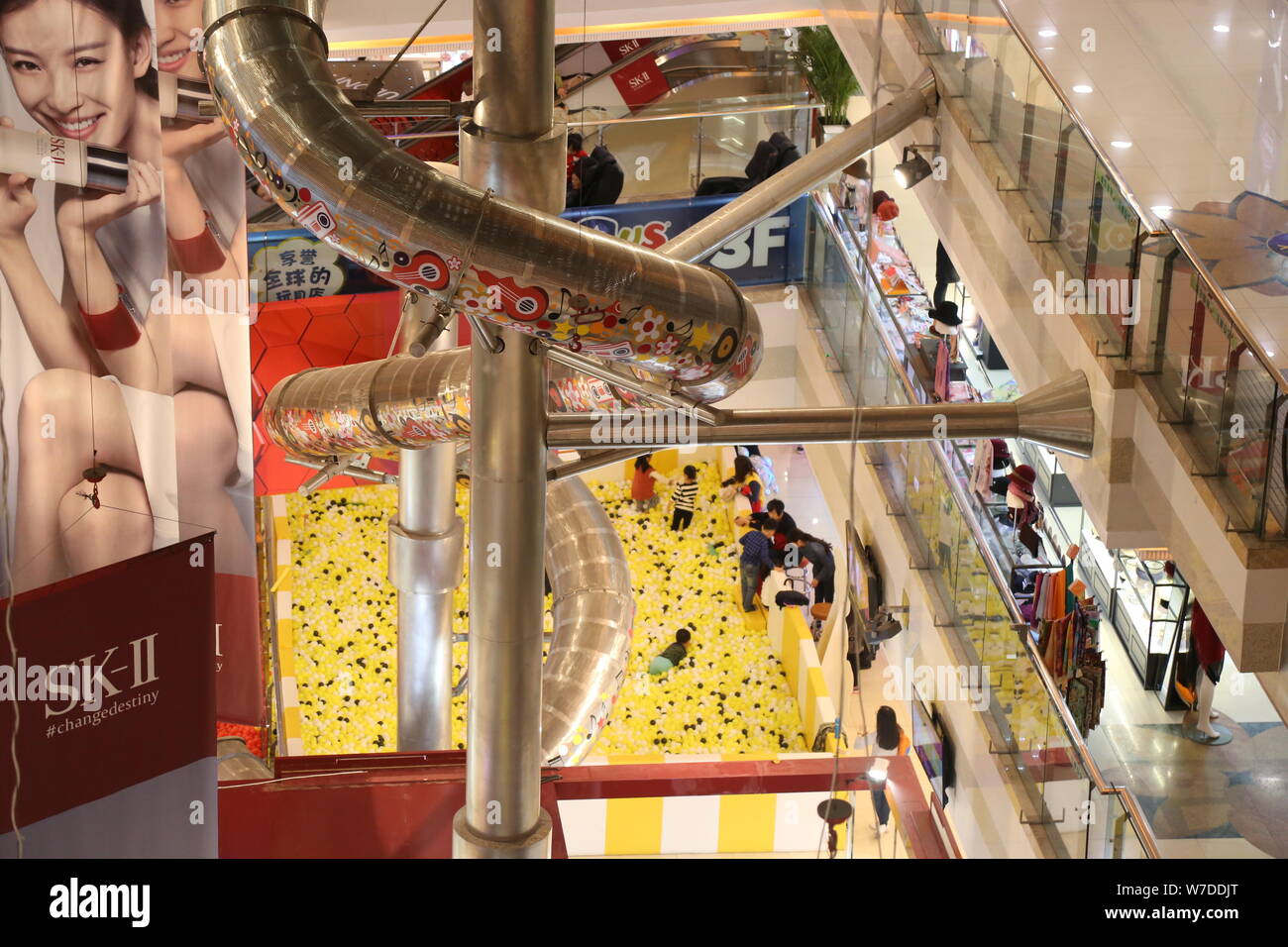 View of a huge slide with four curves at a shopping mall in Shanghai ...