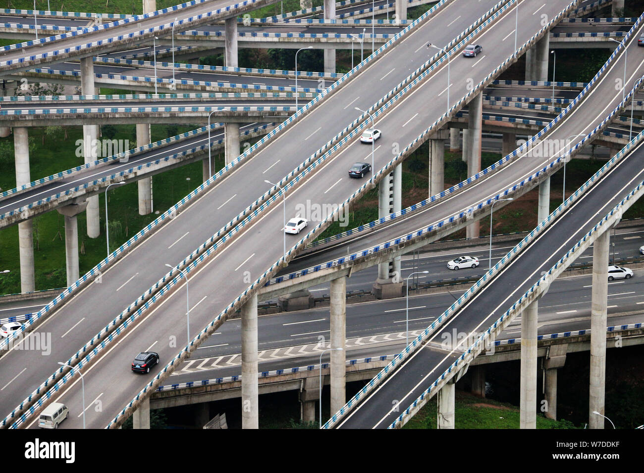 Cars drive on the five-level Huangjuewan Overpass, the world's "most ...