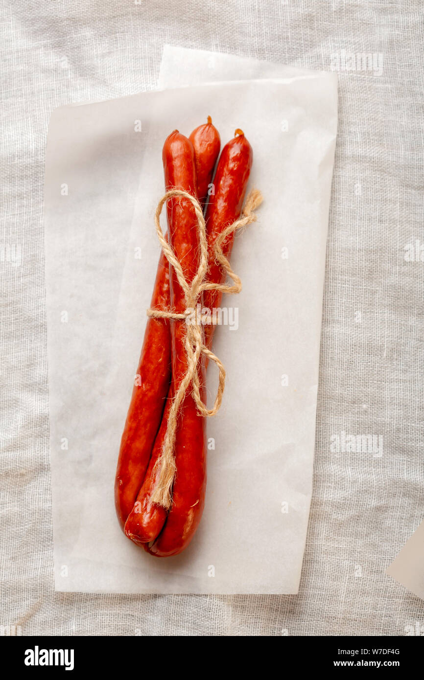 Smocked sausage in bunch, food above Stock Photo - Alamy