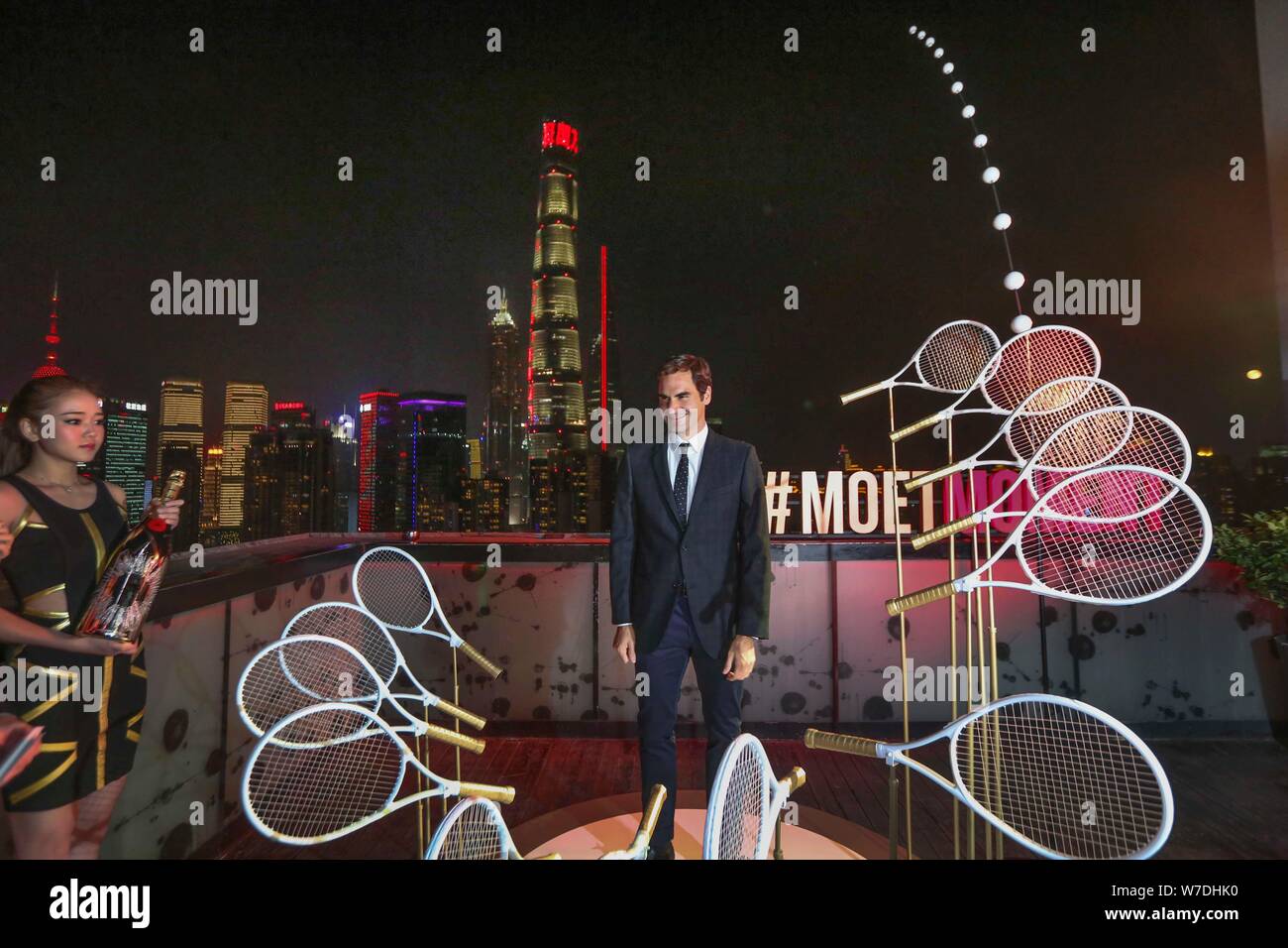 Swiss tennis player Roger Federer poses at the Moet and Chandon Party ...