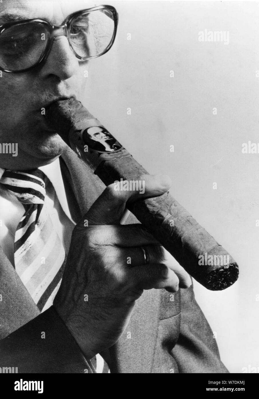 1970s man smoking a cigar hi-res stock photography and images - Alamy