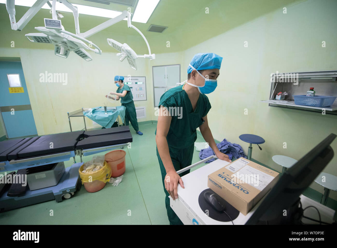 Qiao Rui, right, the sole male chief nurse at the Affiliated Hospital ...