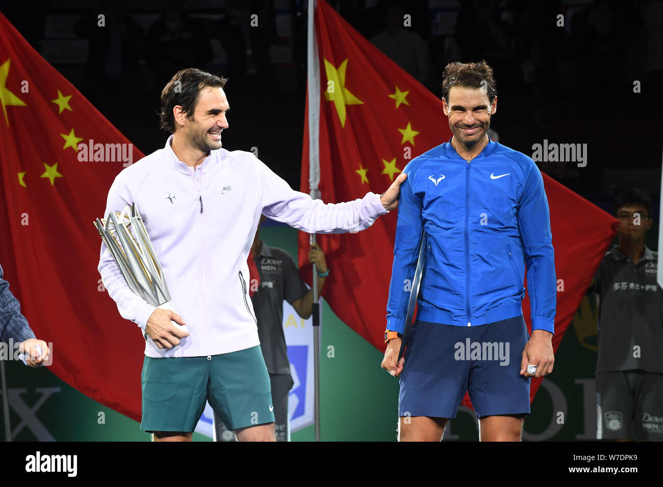 Winner Roger Federer of Switzerland, left, interacts with first runner-up Rafael Nadal of Spain ...