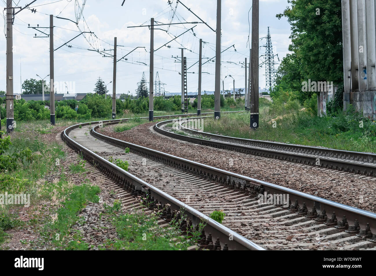 Old rails in landscape. Rails in the land. Rails and cross ties.Railway ...
