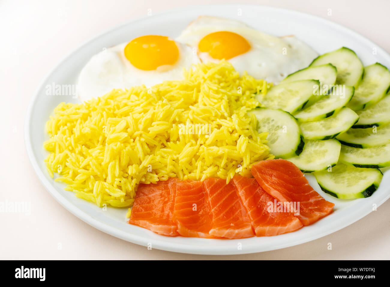 Healthy rice breakfast with fish and eggs Stock Photo - Alamy