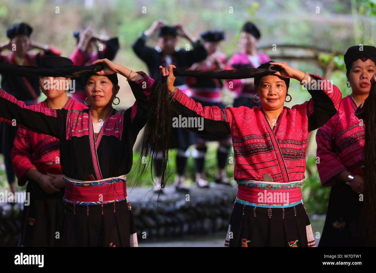 --FILE--Chinese women of Red Yao Ethnic Group dressed in traditional ...