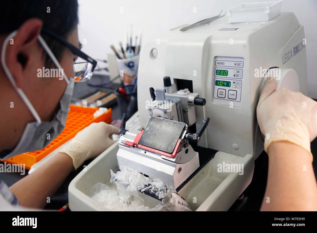 A Chinese researcher does experiments in a lab at the China's largest ...
