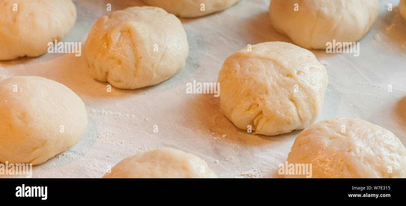 The process of making raw dough with flour in the kitchen Stock Photo ...