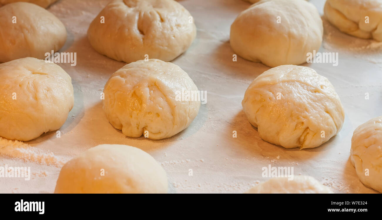 The process of making raw dough with flour in the kitchen Stock Photo ...