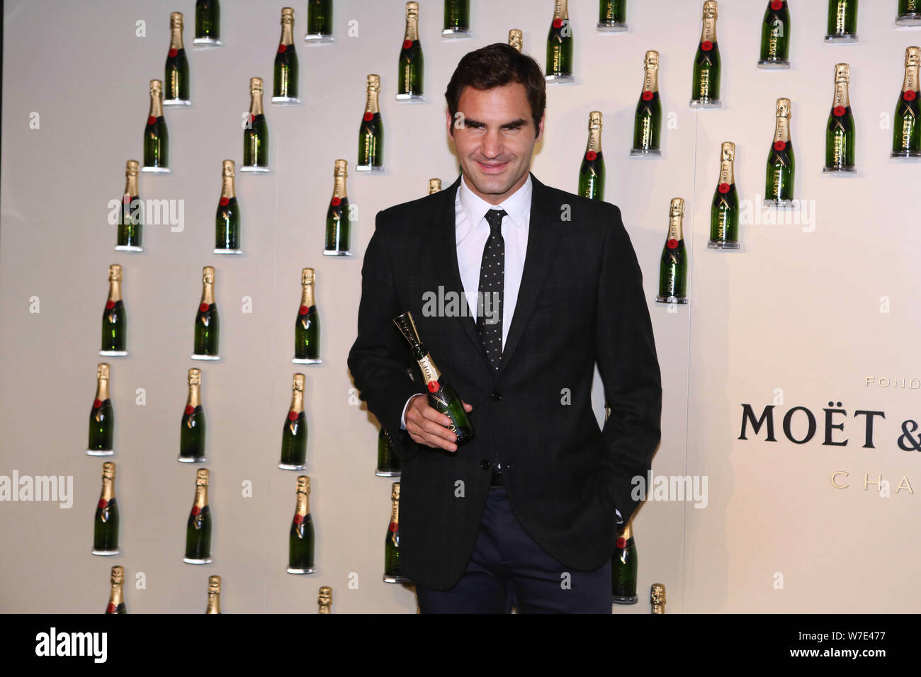 Swiss tennis player Roger Federer poses at the Moet and Chandon Party ...