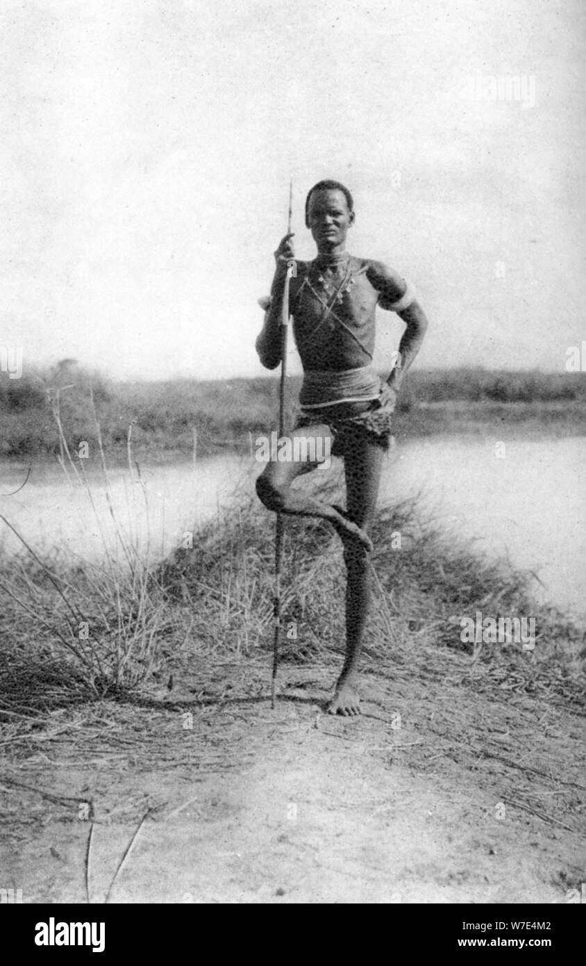 A characteristic Dinka attitude, Terrakekka to Aweil, Sudan, 1925 (1927 ...
