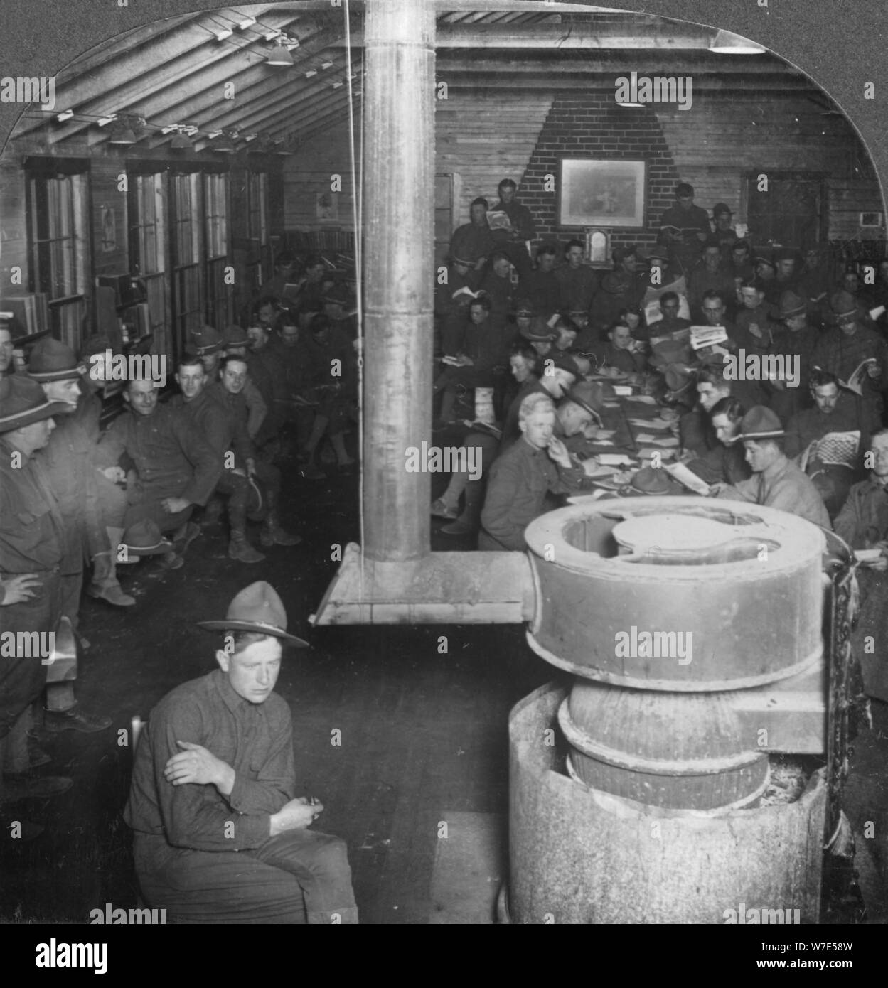 Social room of a YMCA army camp hut, early 20th century. Artist ...