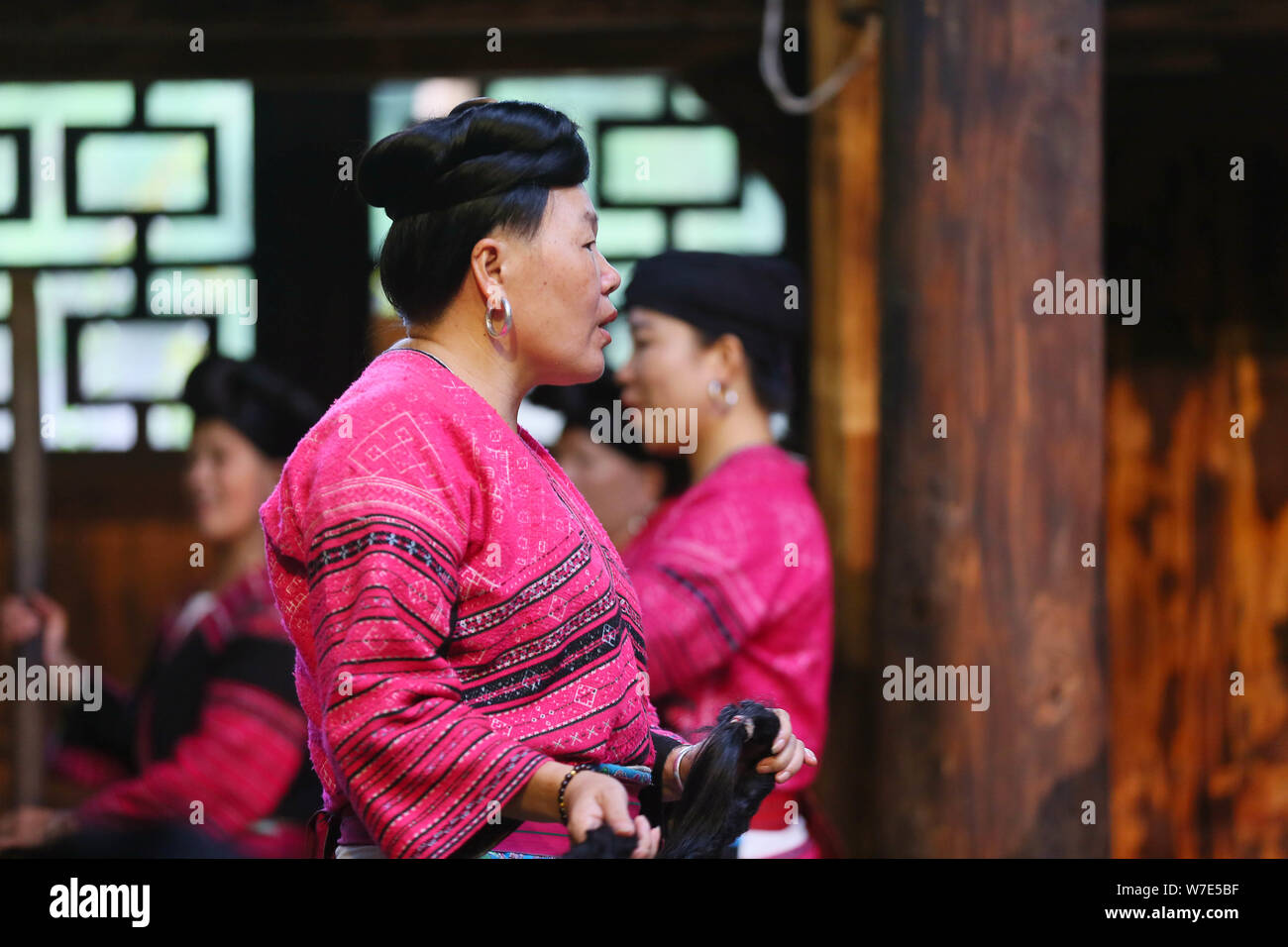 --FILE--A Chinese woman of Red Yao Ethnic Group dressed in traditional ...