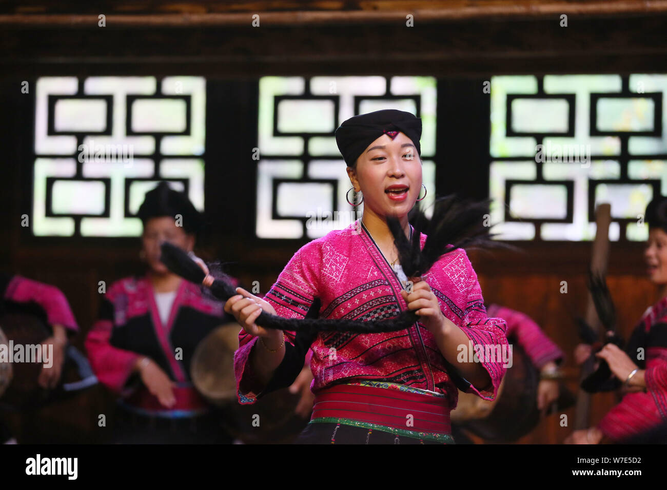 --FILE--A Chinese woman of Red Yao Ethnic Group dressed in traditional ...