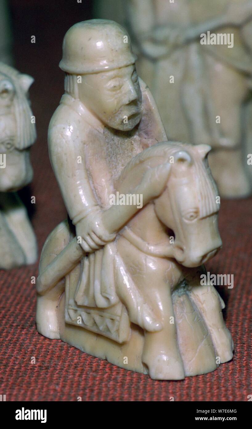 A Knight - The Lewis Chessmen, (Norwegian?), c1150-c1200. Artist ...